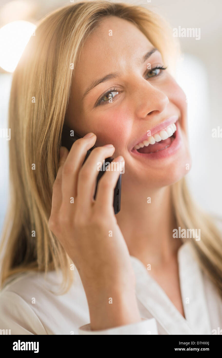Woman talking on phone Stock Photo - Alamy