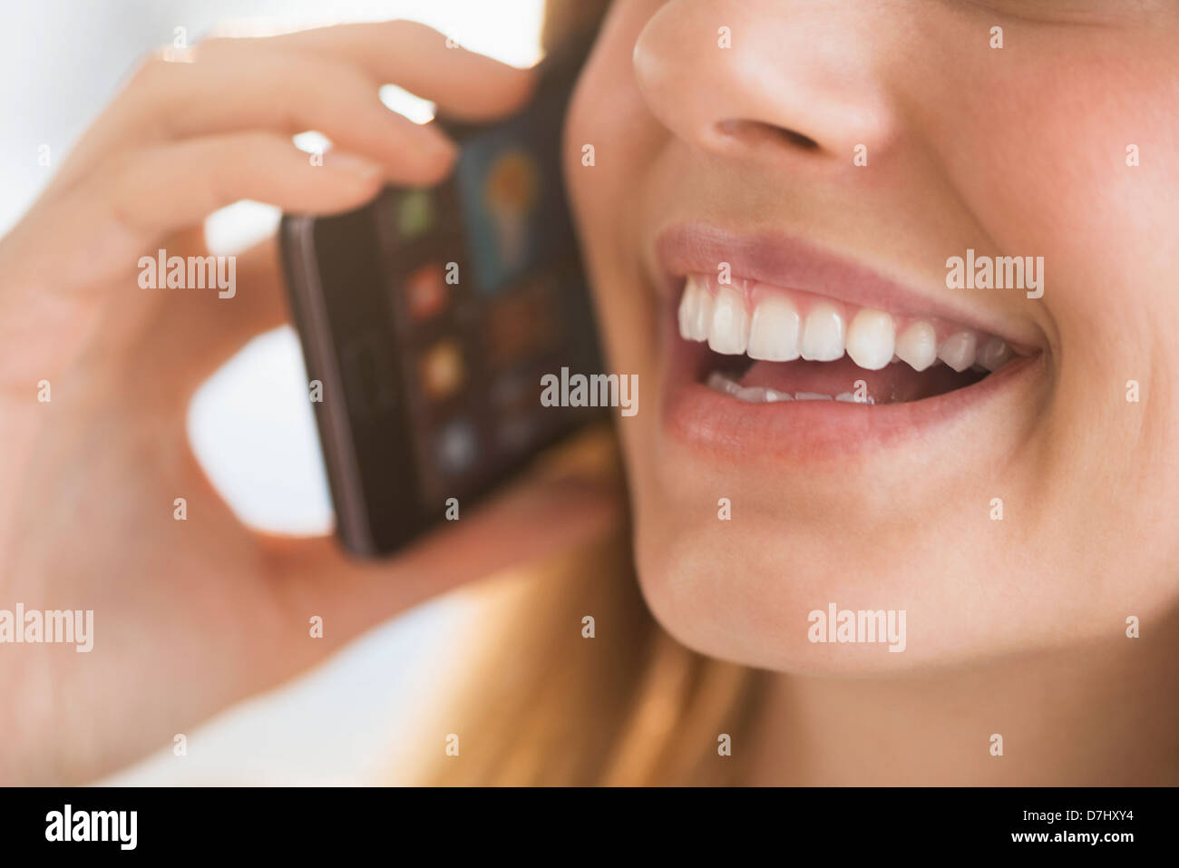 Close-up of woman talking on phone Stock Photo - Alamy