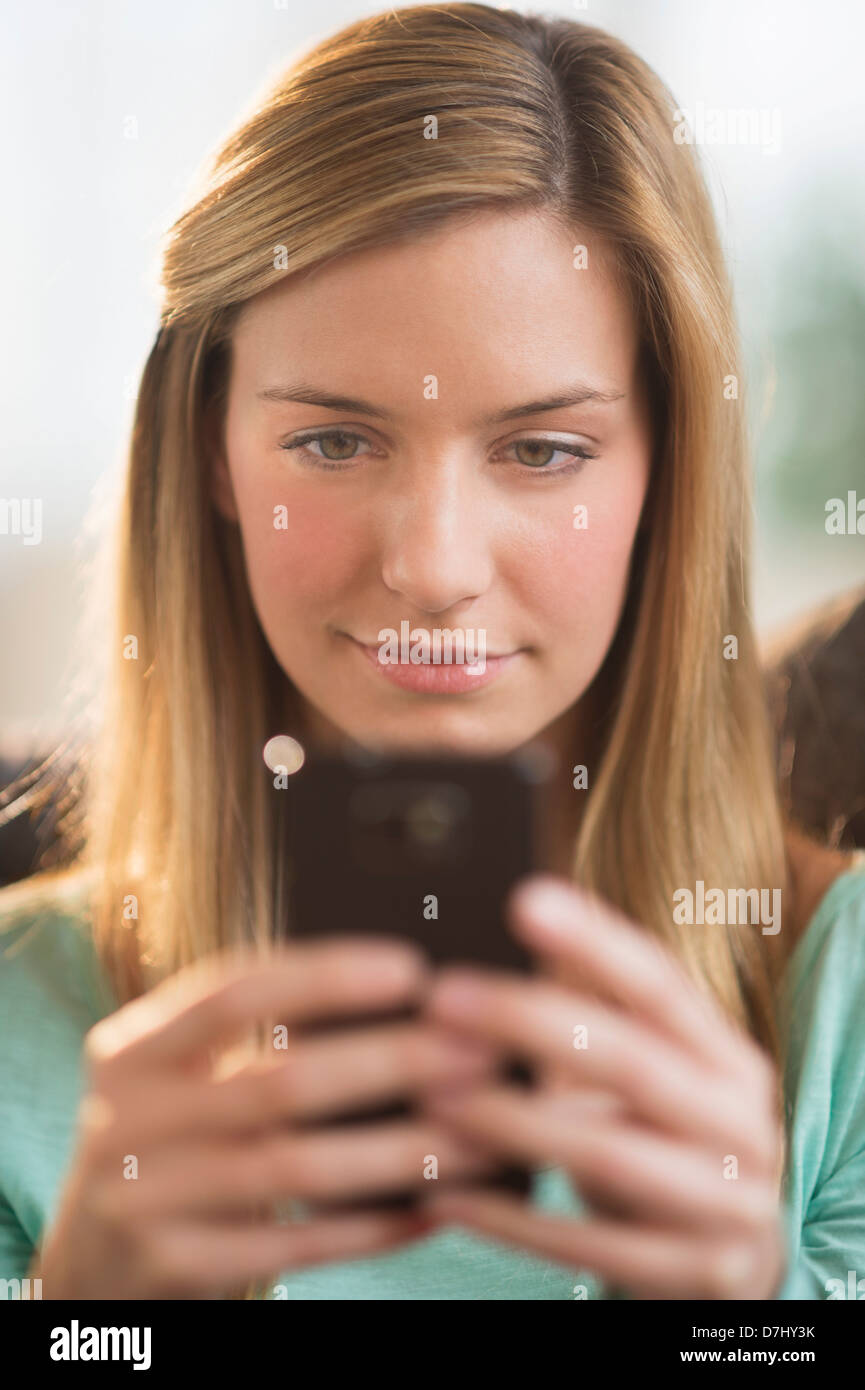 Woman messaging on modern smartphone hi-res stock photography and ...