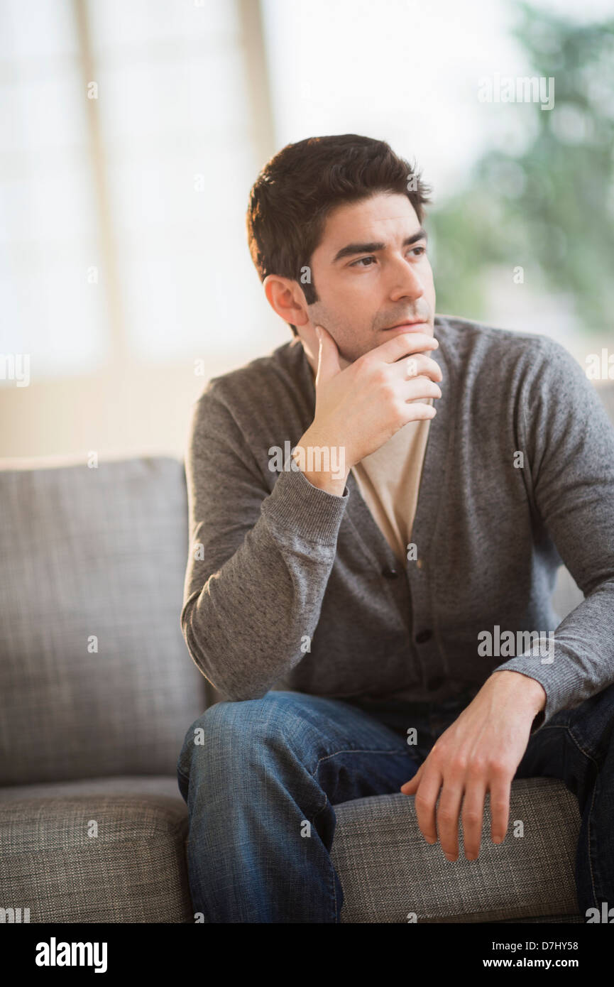 Portrait of mid adult man at home Stock Photo - Alamy