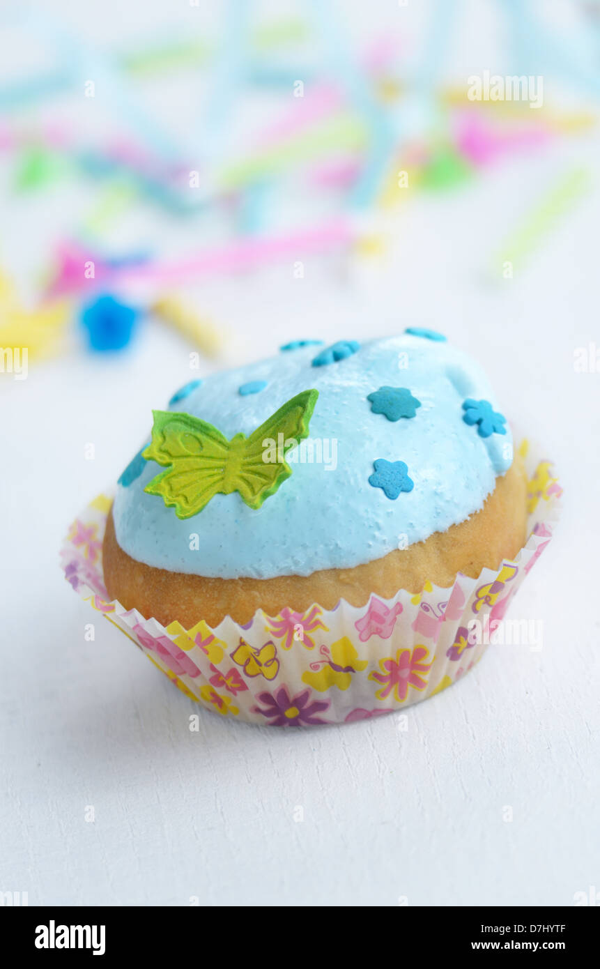 Cupcake with sugar butterfly Stock Photo - Alamy