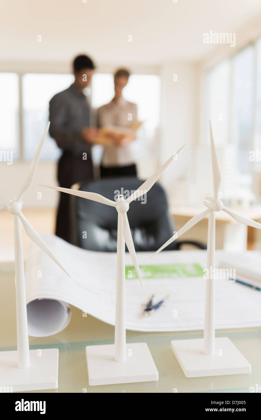 Scale models of wind turbines on office desk Stock Photo - Alamy