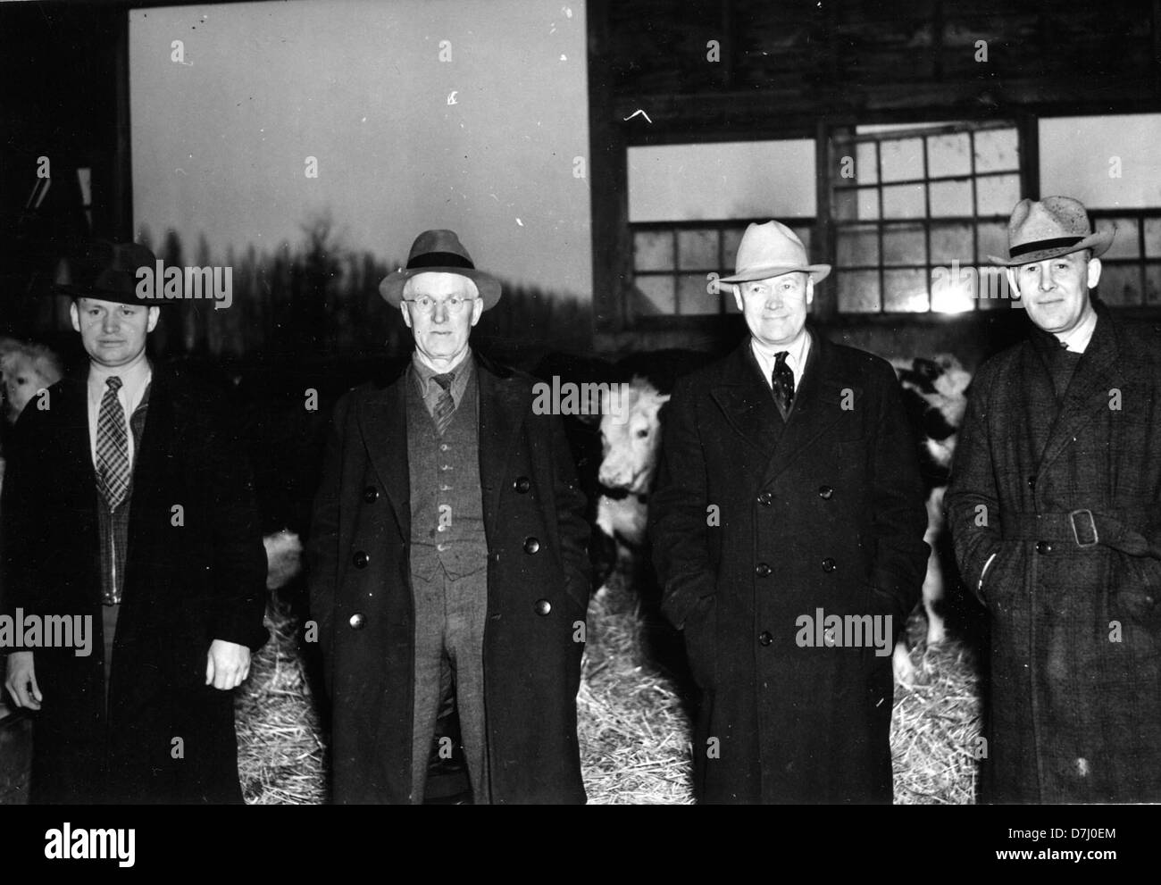 This historical image from 1936 shows County Agent Rex Warren alongside ...