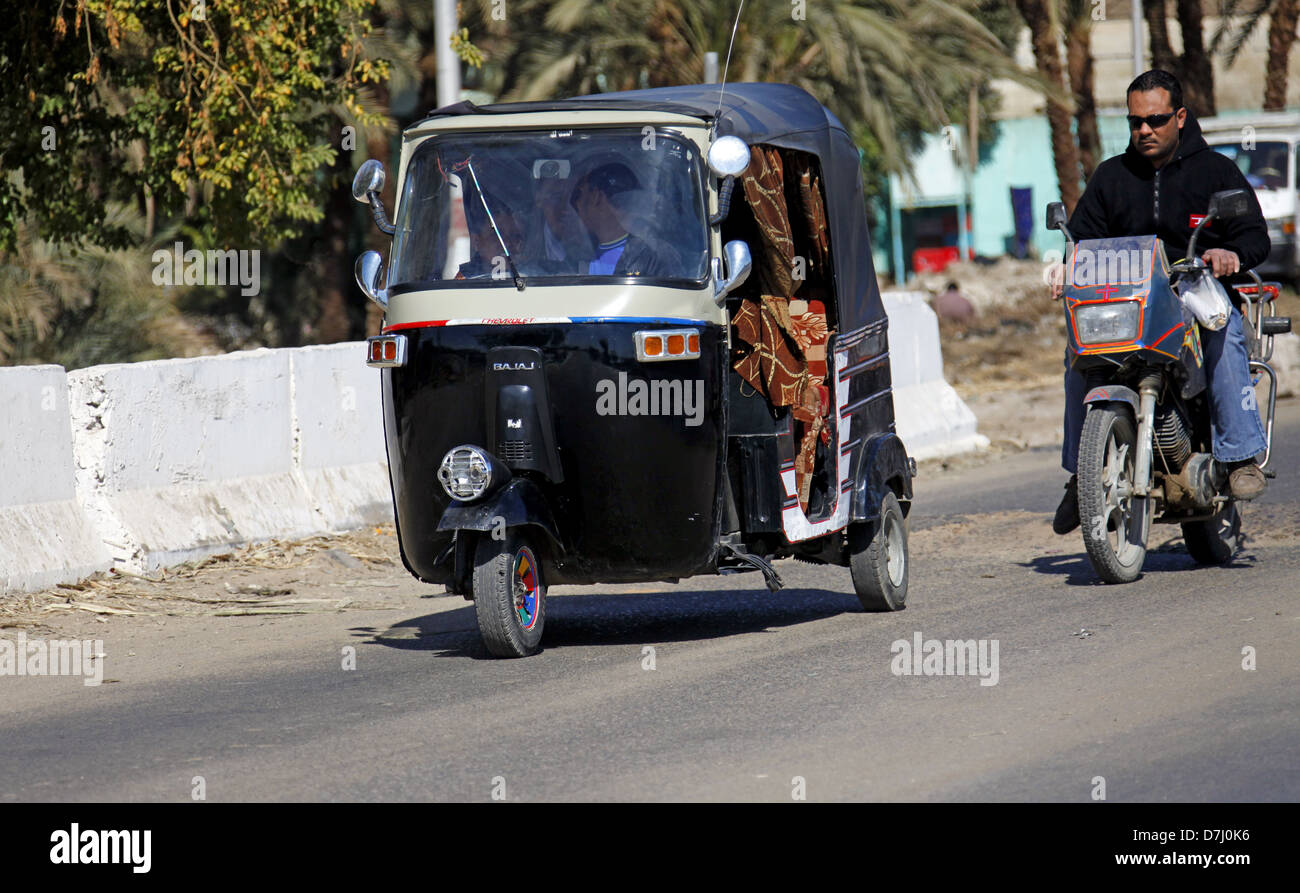 TUC-TUC & MOTOR CYCLE NEAR ASWAN EGYPT 11 January 2013 Stock Photo - Alamy