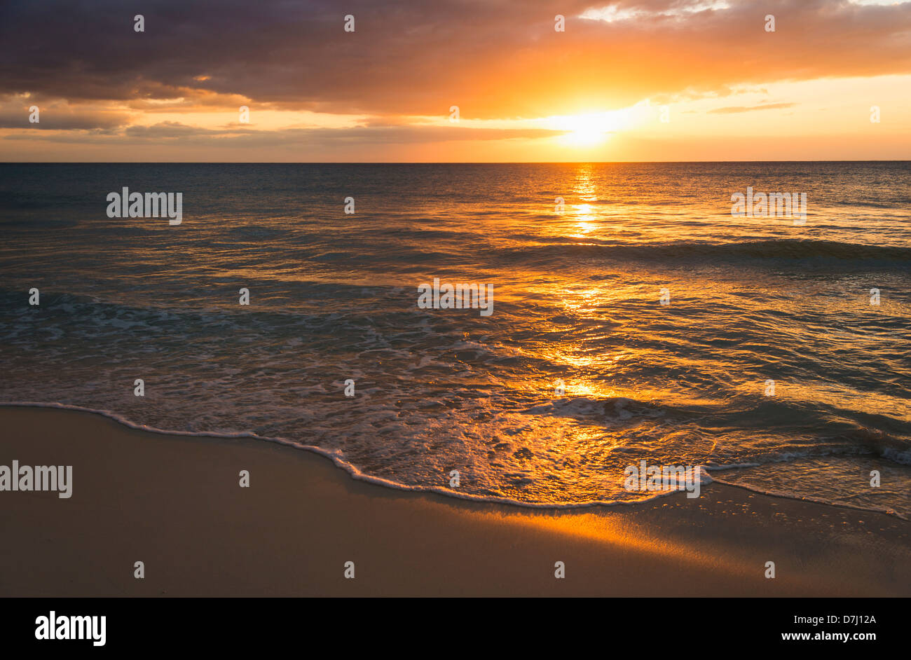Jamaica, Sun setting over sea Stock Photo - Alamy