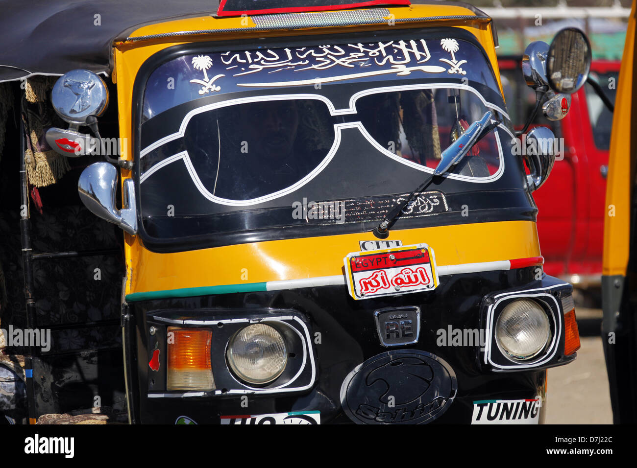 BLACK & YELLOW TUC-TUC NEAR ASWAN EGYPT 11 January 2013 Stock Photo - Alamy