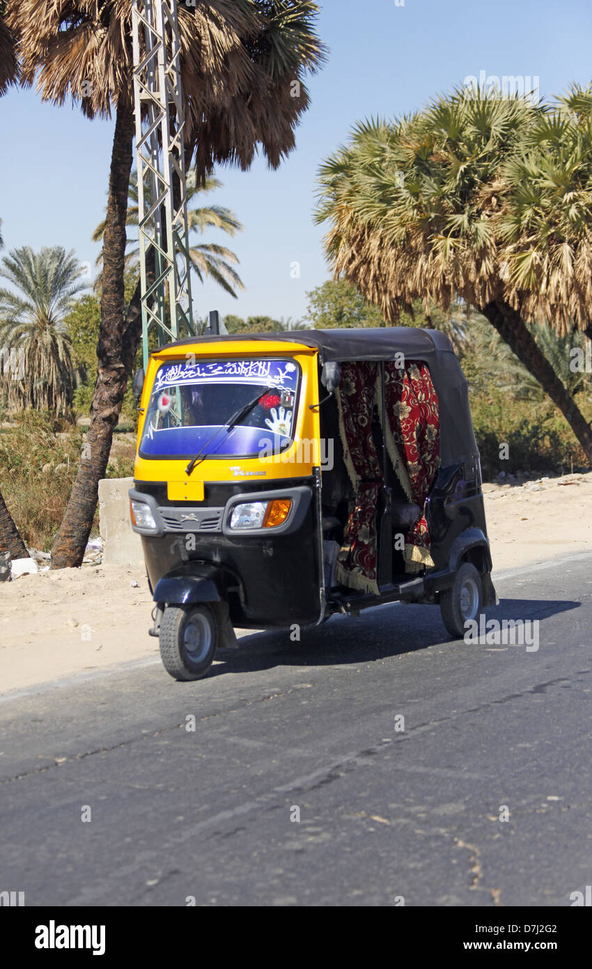 BLACK & YELLOW TUC-TUC NEAR ASWAN EGYPT 11 January 2013 Stock Photo - Alamy