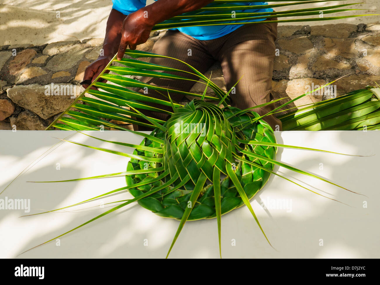 Jamaica, Man making hut with palm leaves Stock Photo - Alamy
