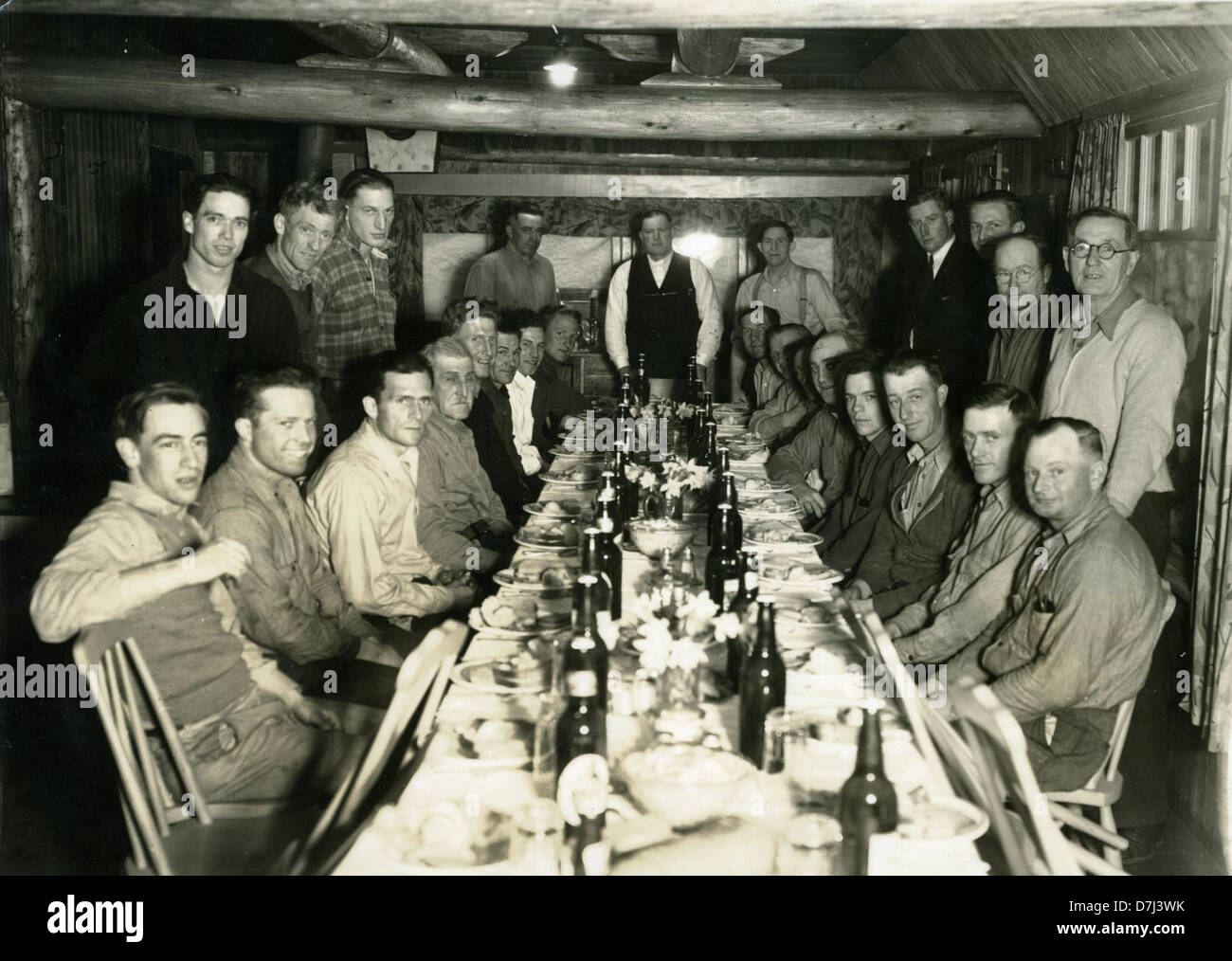 This image captures a highway crew working, showcasing the workforce ...