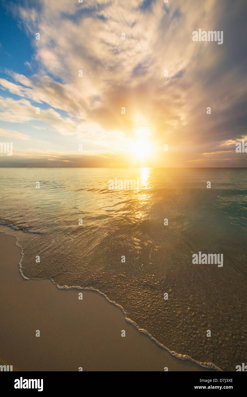 Jamaica, Sun setting over sea Stock Photo - Alamy