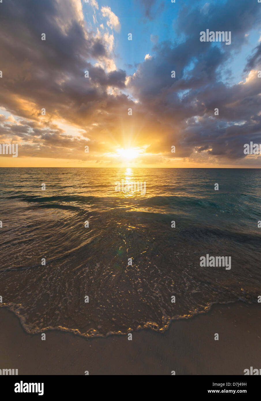 Jamaica, Sun setting over sea Stock Photo - Alamy