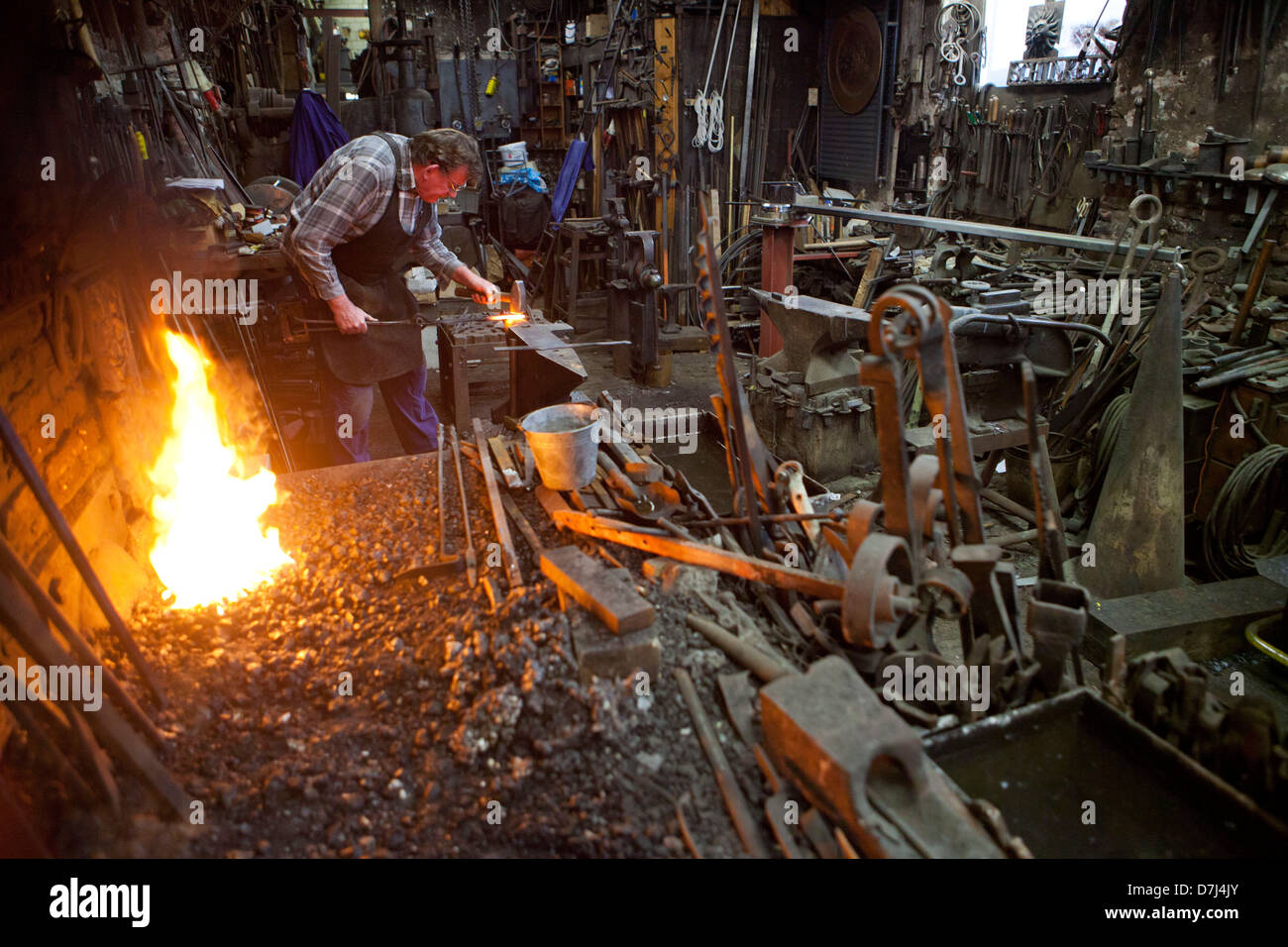 traditional blacksmith at work in Holland Stock Photo - Alamy