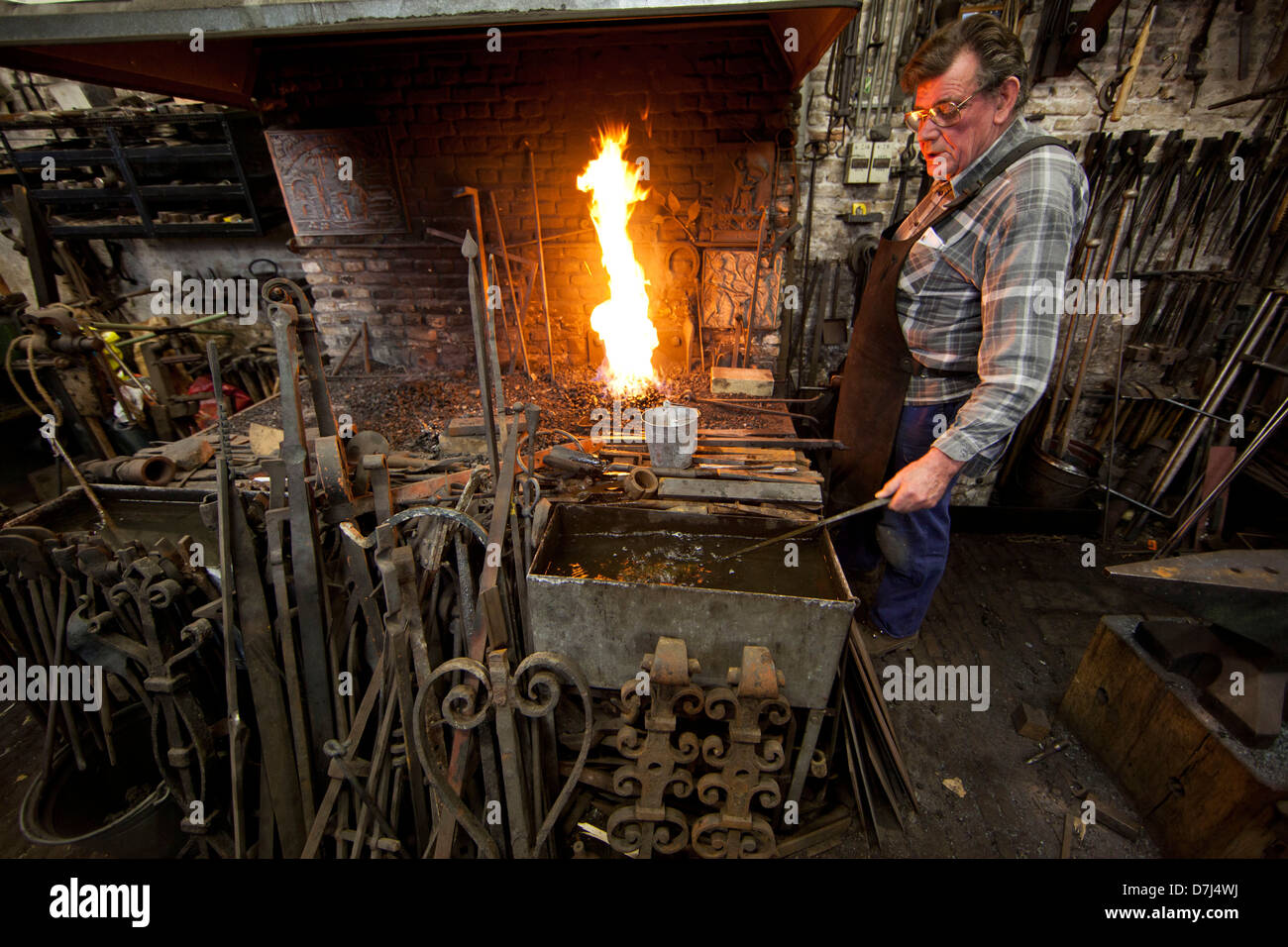 traditional blacksmith at work in Holland Stock Photo - Alamy