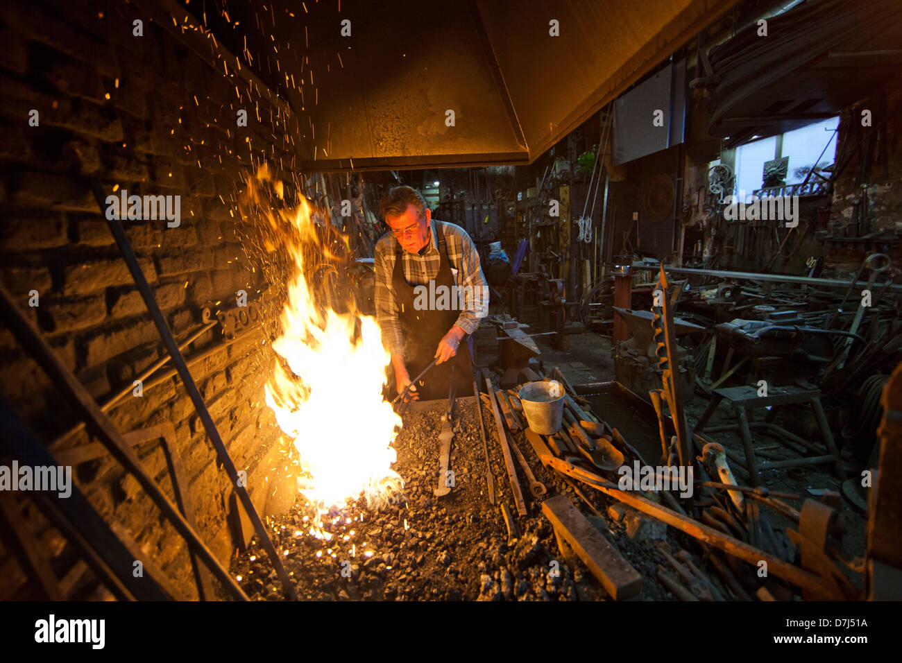 traditional blacksmith at work in Holland Stock Photo - Alamy