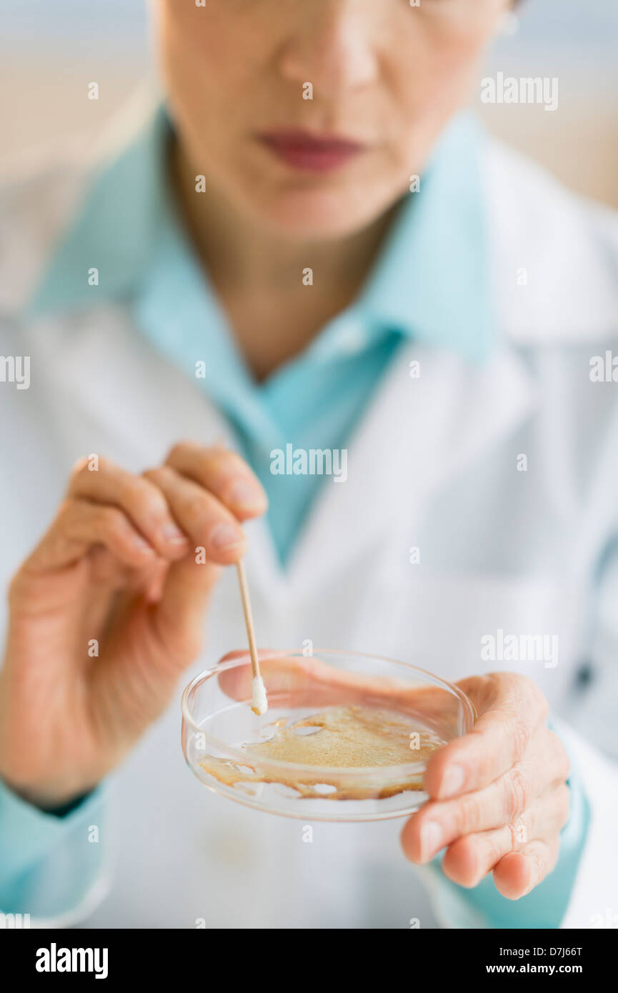 Science woman swab in hi-res stock photography and images - Alamy