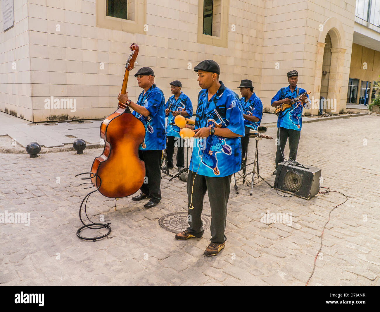 Cuban street musicians play and sing in the streets of Havana Vieja in ...
