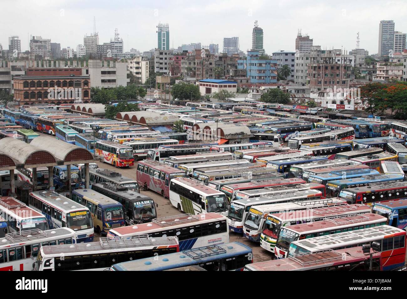 Several hundreds buses remained parked idle at the Mohakhali Inter ...