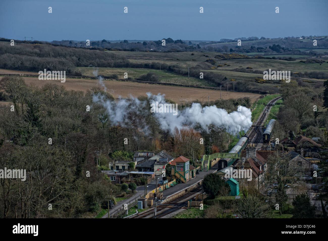 Swanage steam railway train leaving Corfe Castle railway station on its ...