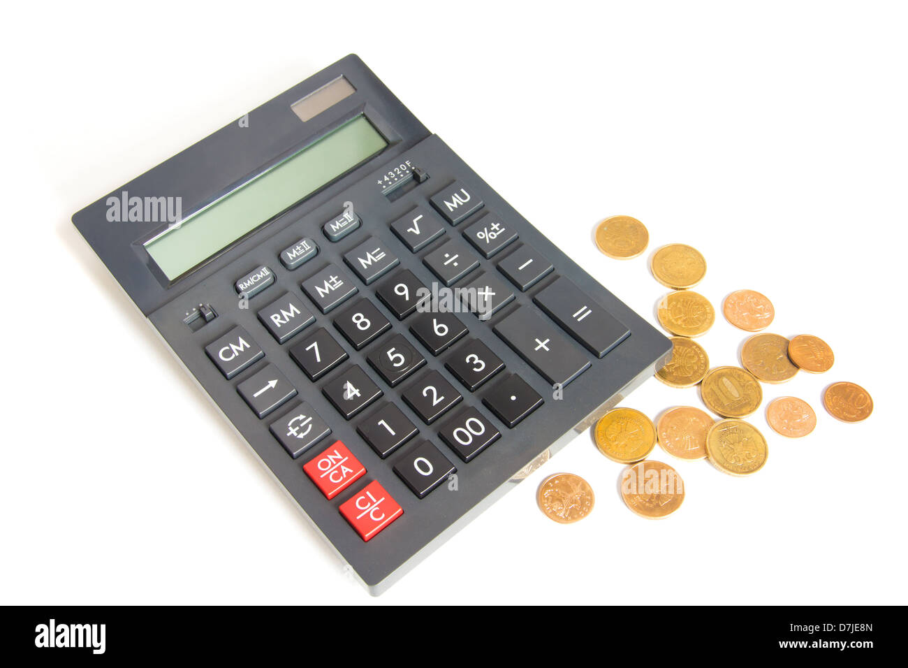 Сalculator and coins close up isolated on white background Stock Photo ...