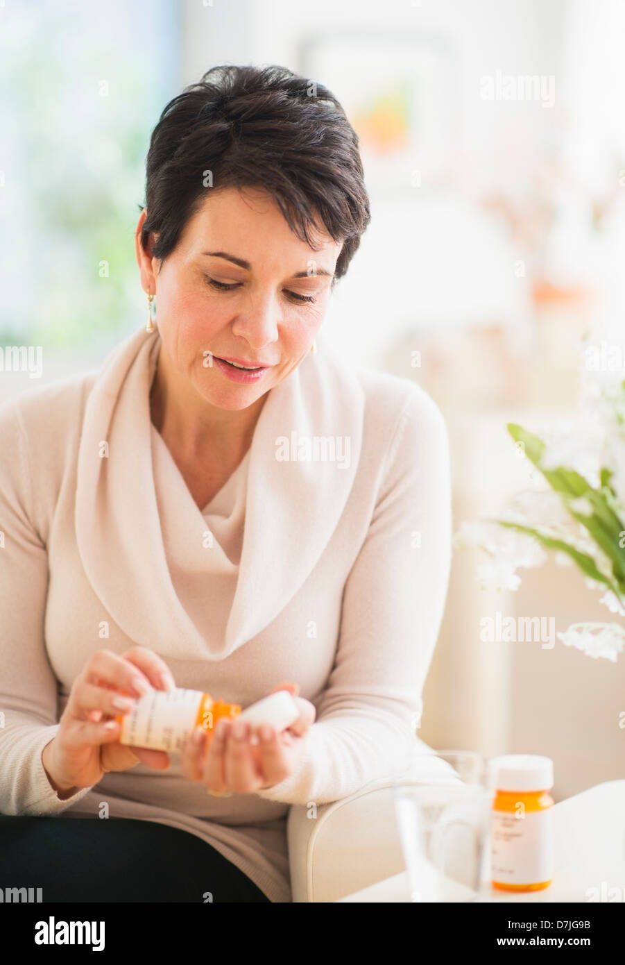 Taking pills hi-res stock photography and images - Alamy
