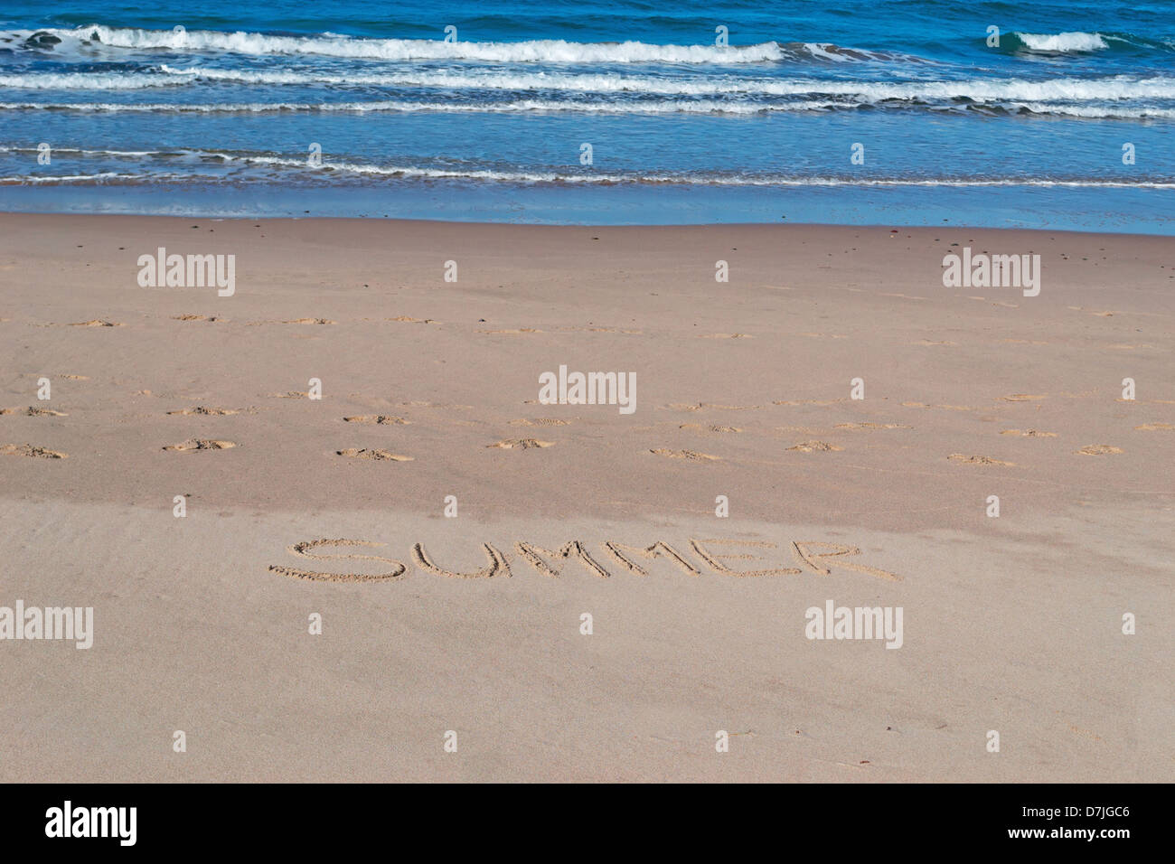 golden shore with "summer" written in the sand Stock Photo - Alamy