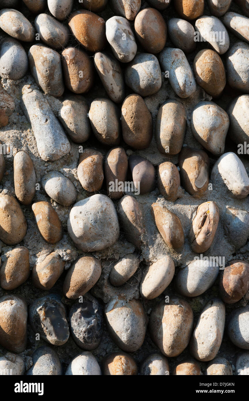 Detail of a flint cobbled wall with sidelight given good texture. Could ...