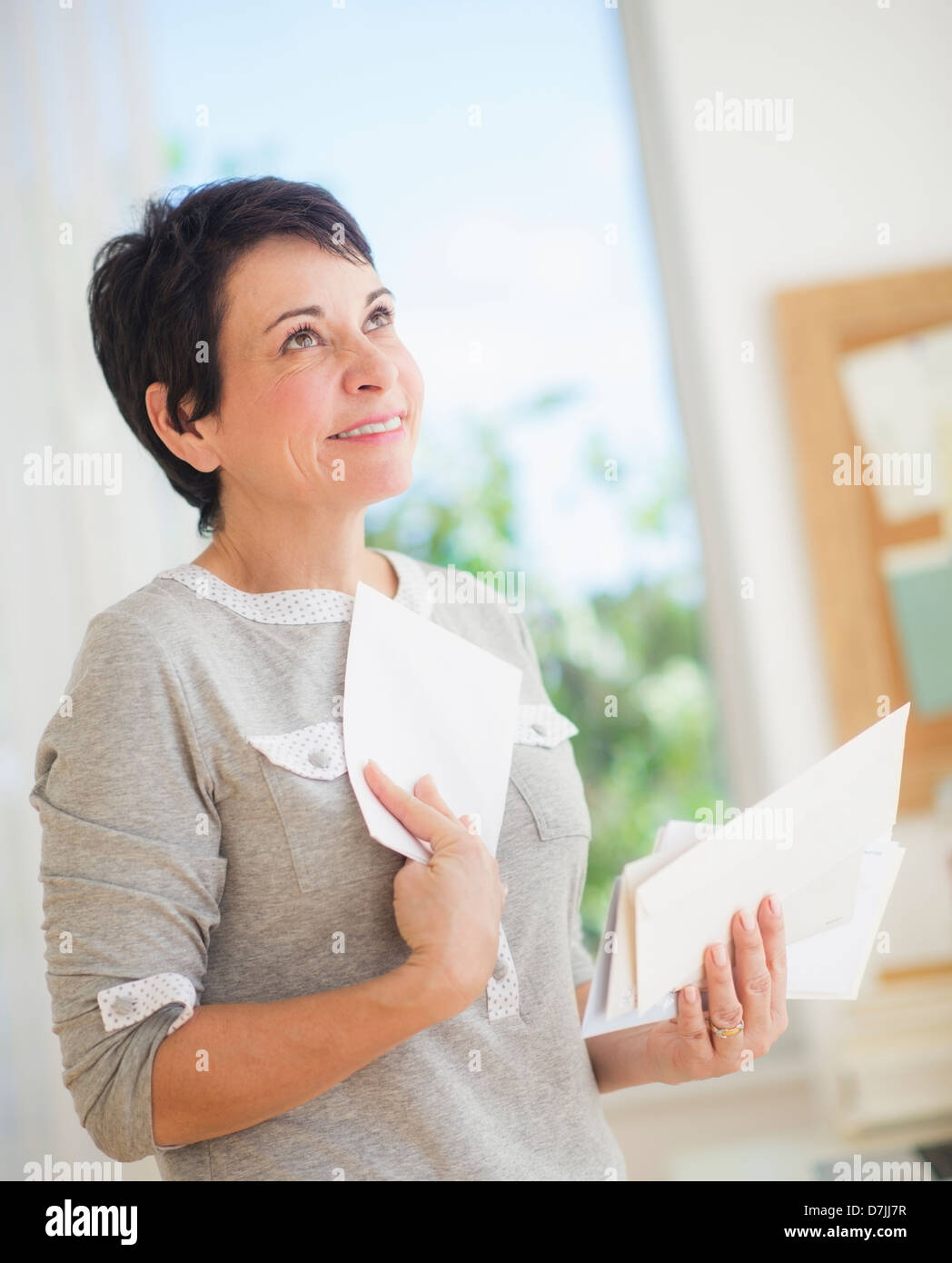 Woman with letters hi-res stock photography and images - Alamy