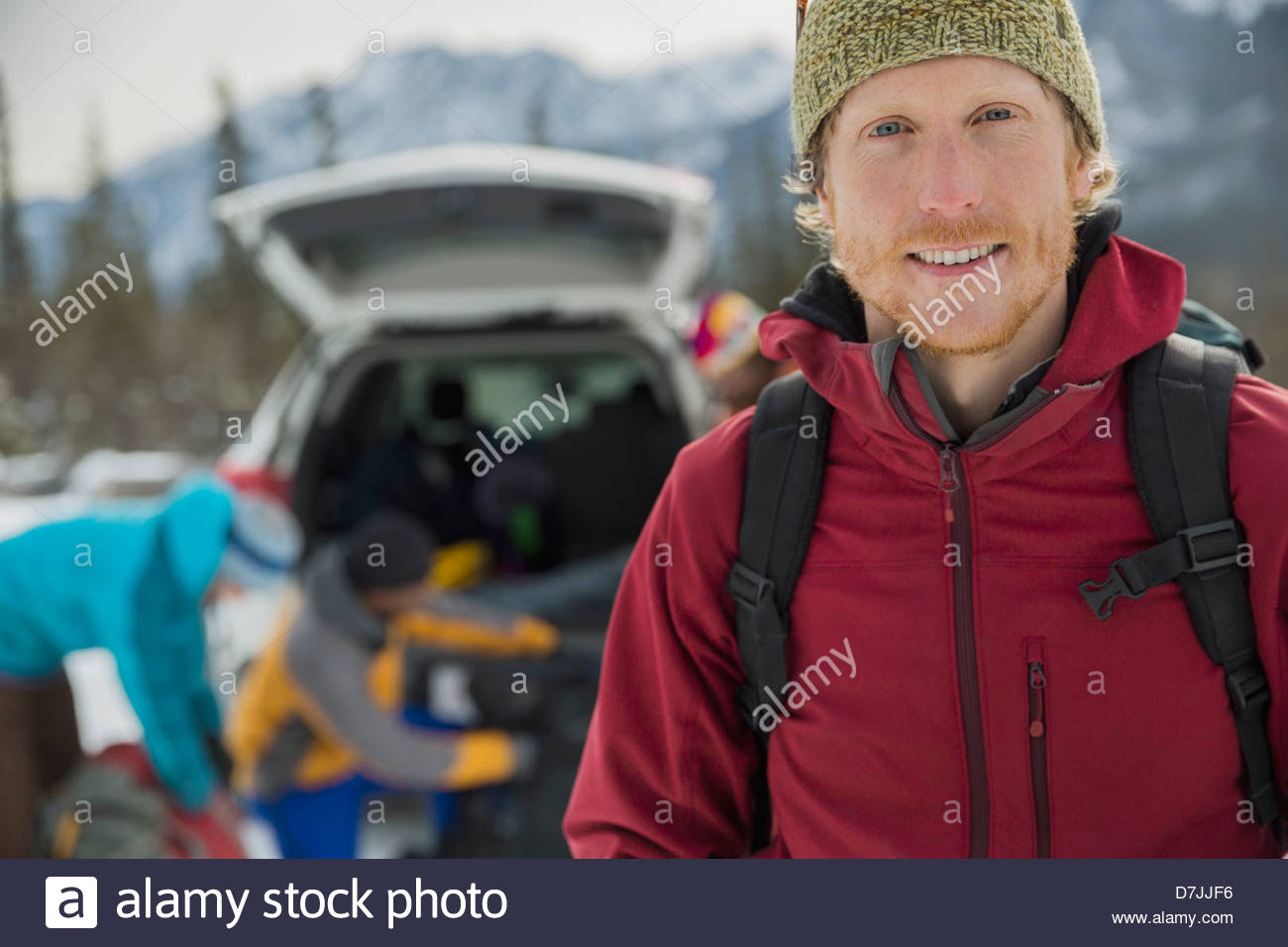 Portrait smiling man winter mountains hi-res stock photography and ...