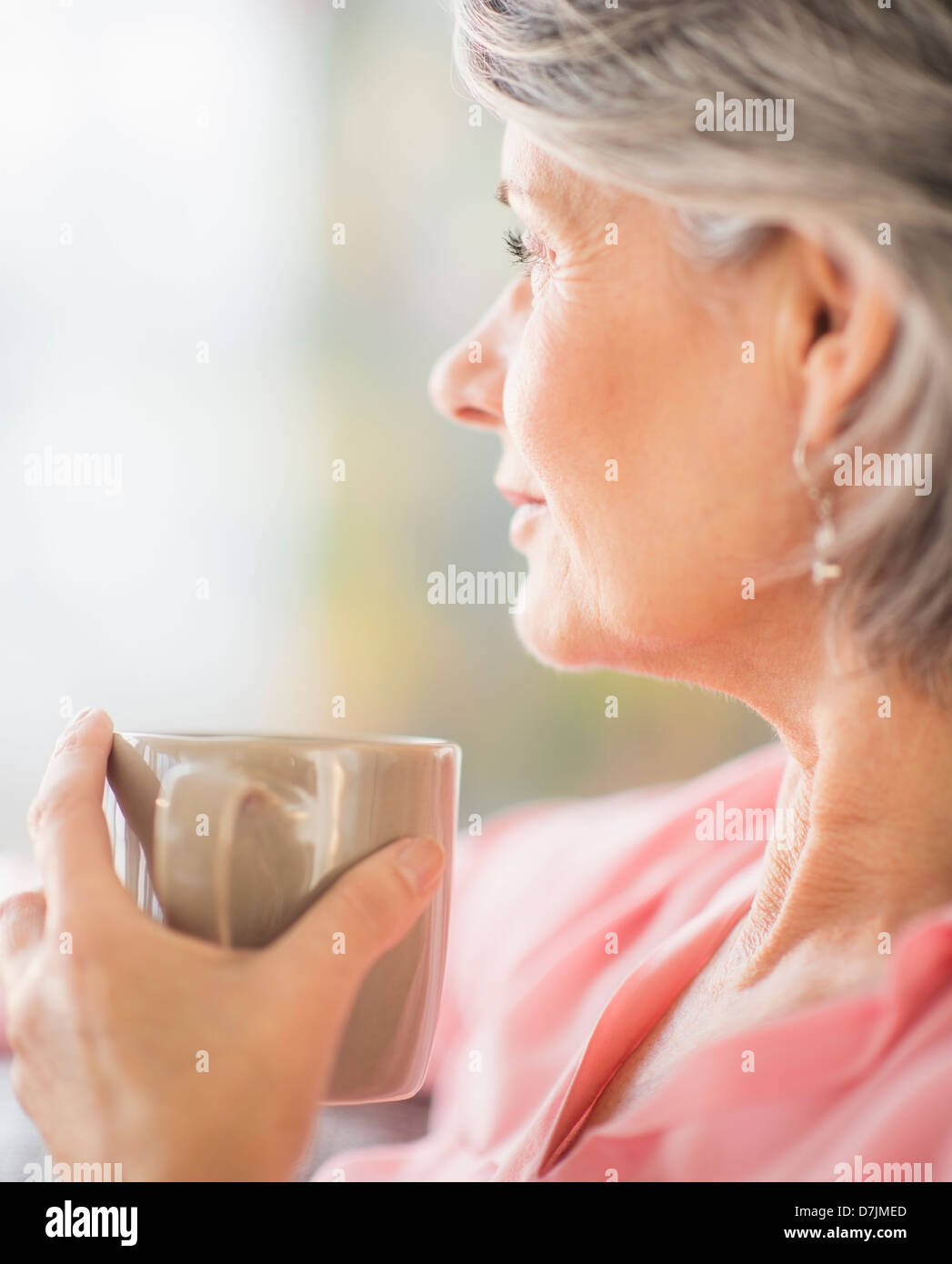 Portrait of woman relaxing Stock Photo - Alamy