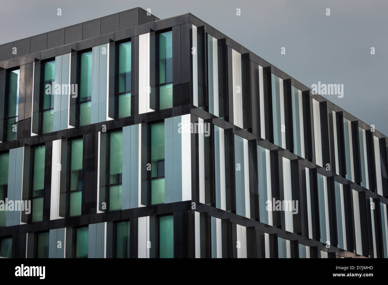 Architectural detail of a modern building with many windows Stock Photo ...