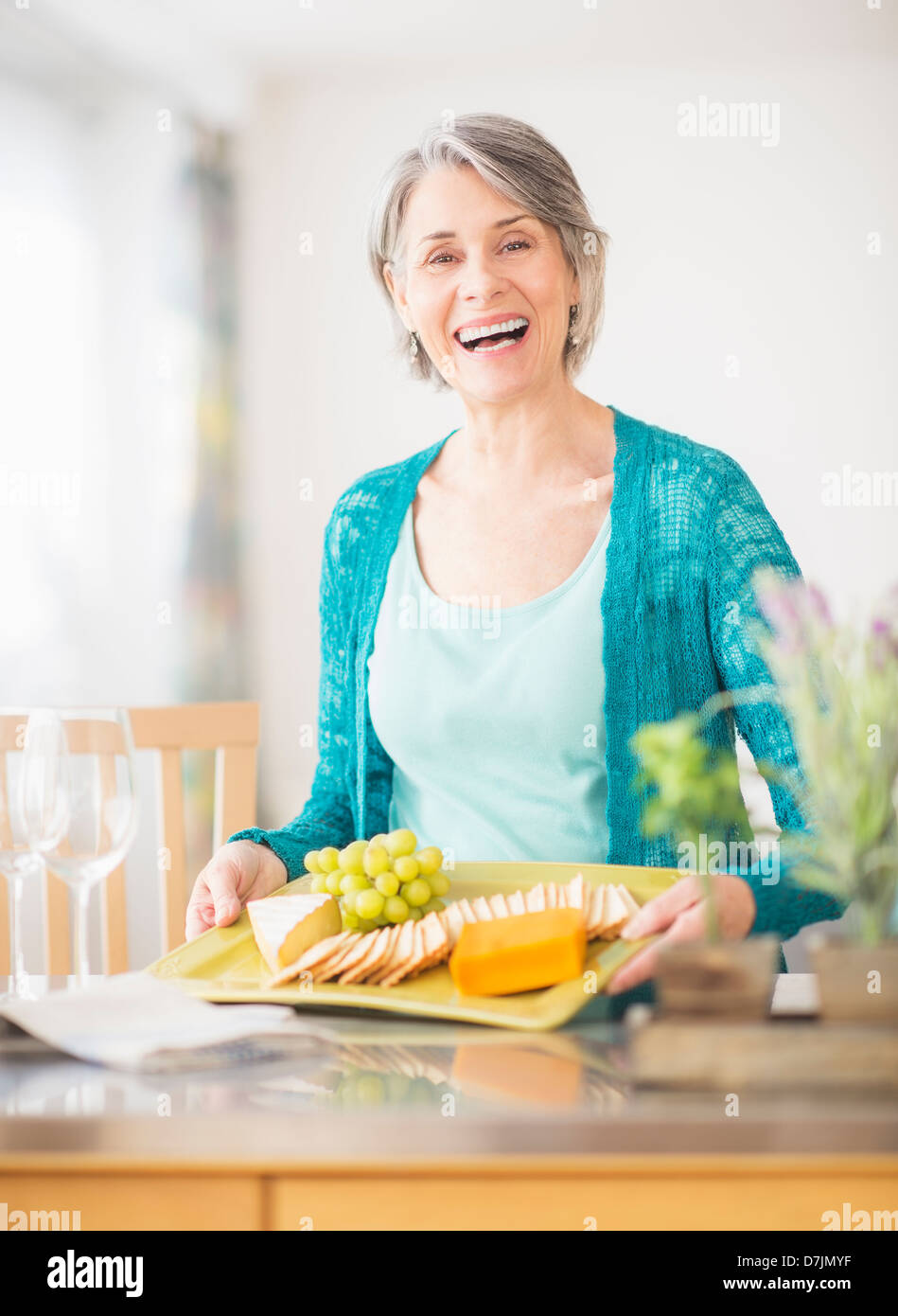 Woman cheese plate hi-res stock photography and images - Alamy