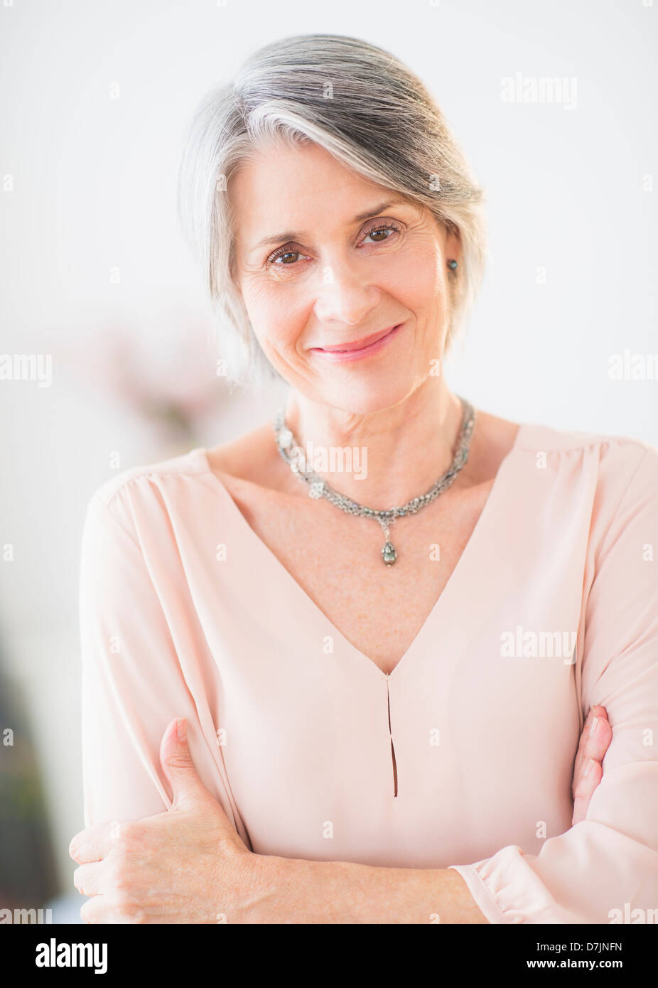 Portrait of content woman Stock Photo - Alamy