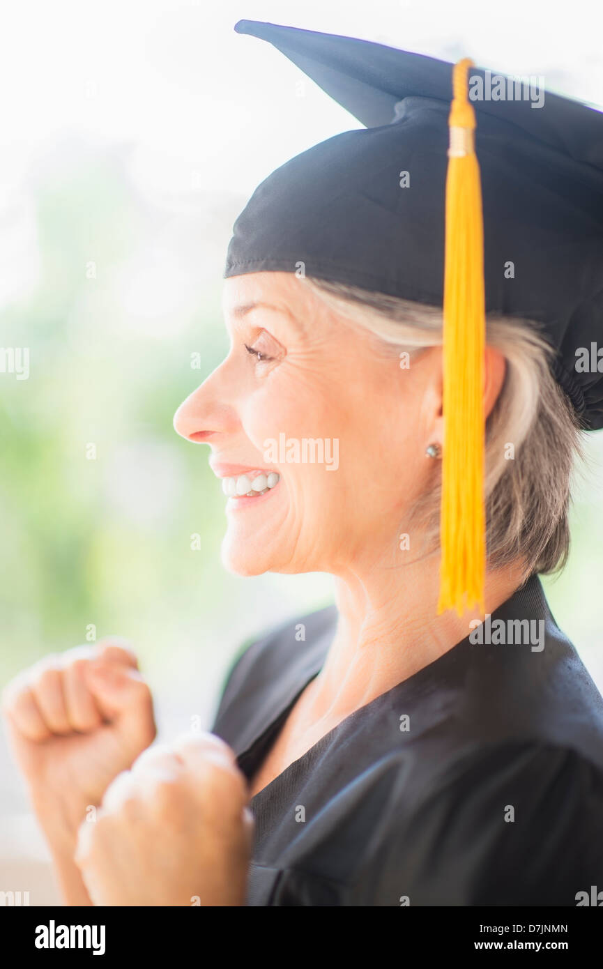 Portrait of woman in graduation cap Stock Photo - Alamy