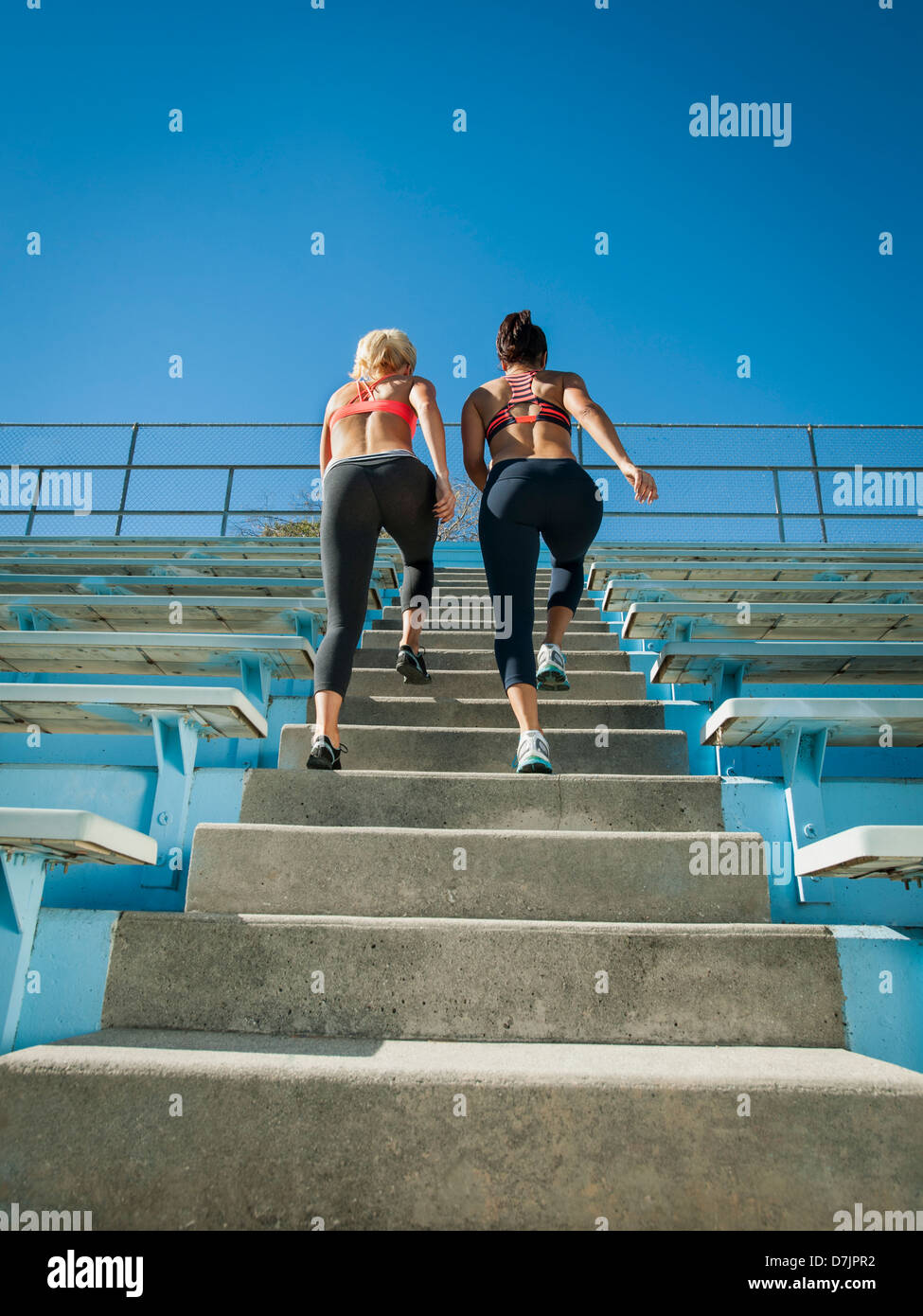 USA, California, Los Angeles, Two women walking up steps Stock Photo ...