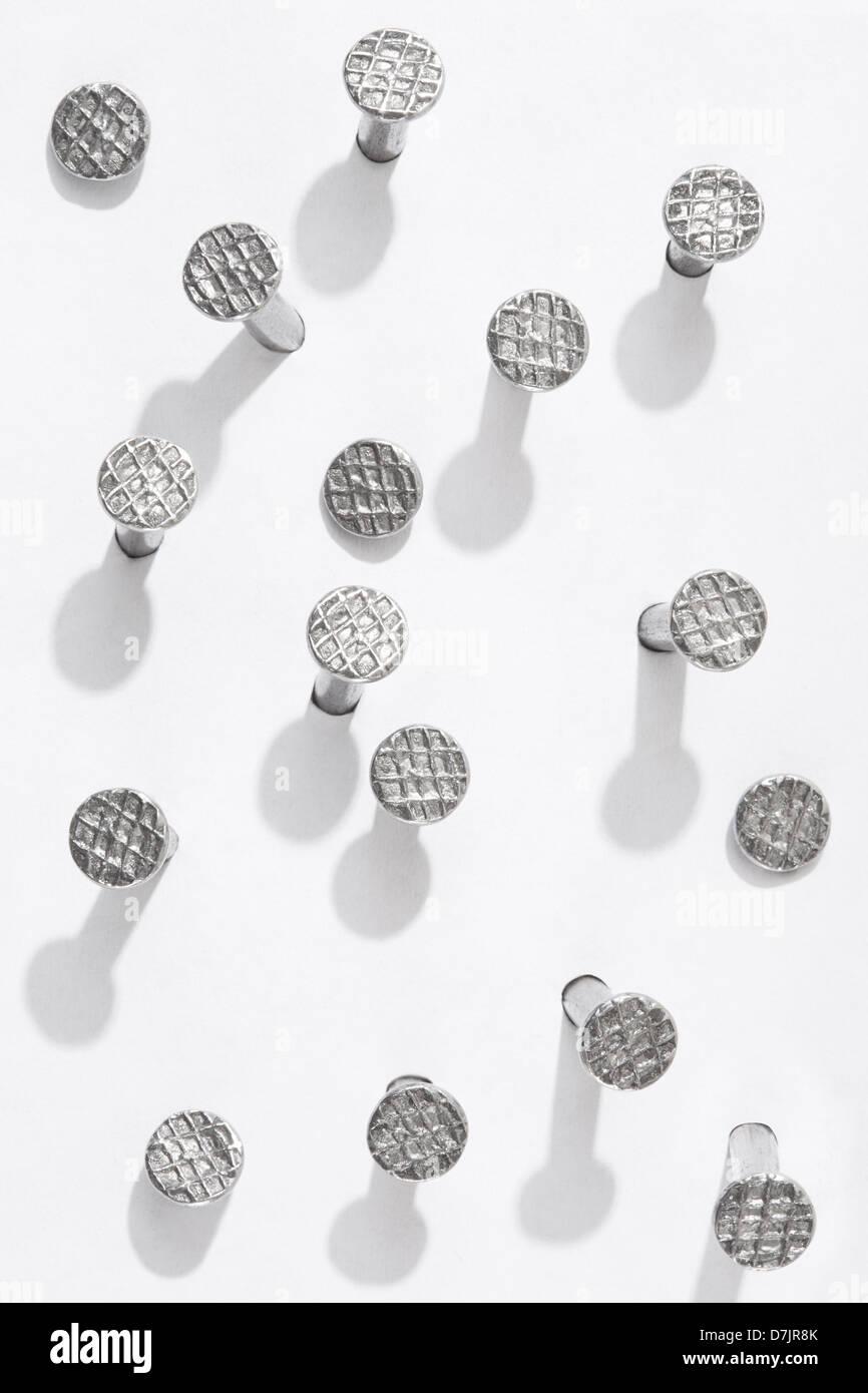 Metal nails collection with shadow Stock Photo - Alamy