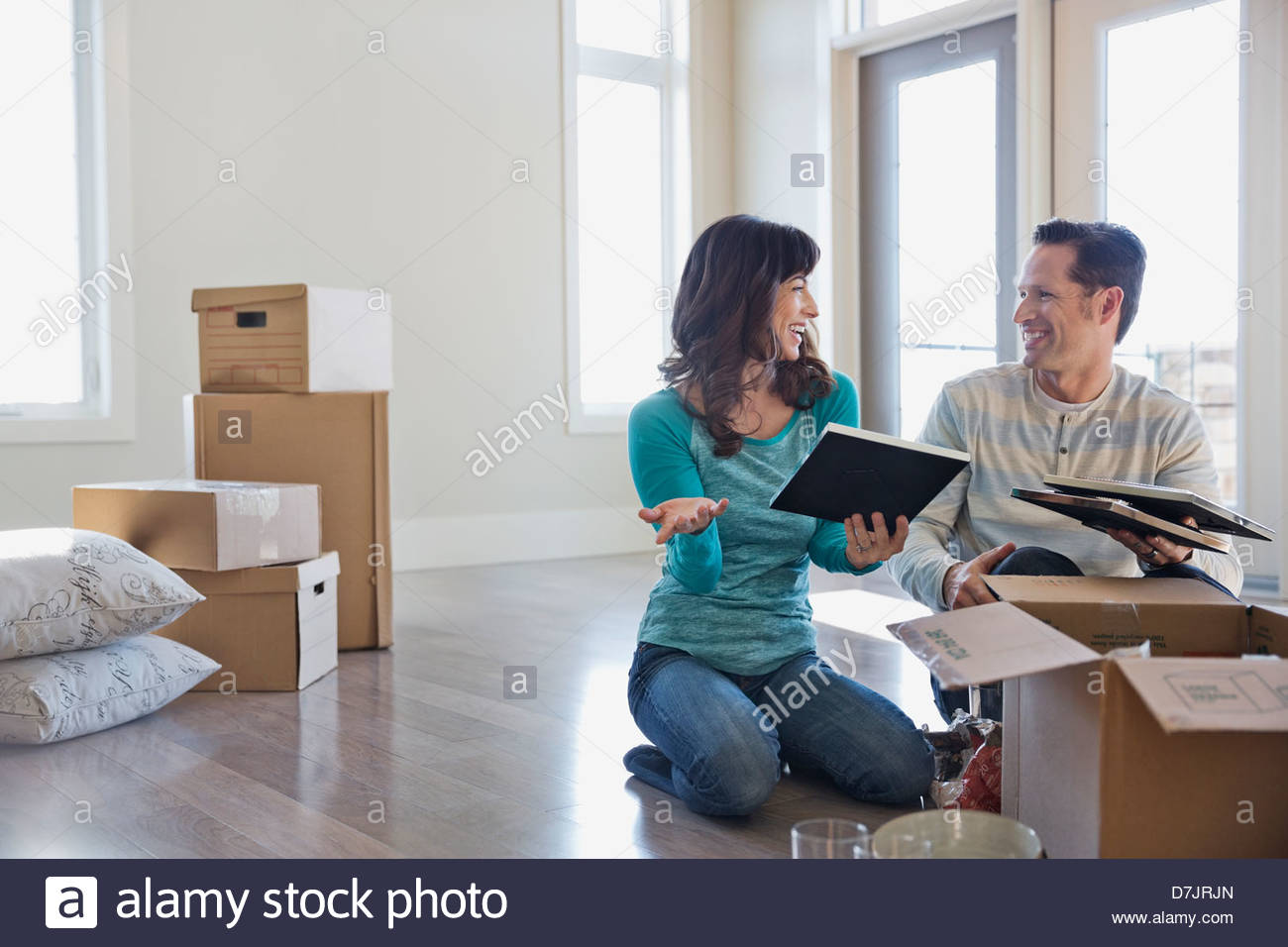 Unpacking cardboard boxes hi-res stock photography and images - Alamy