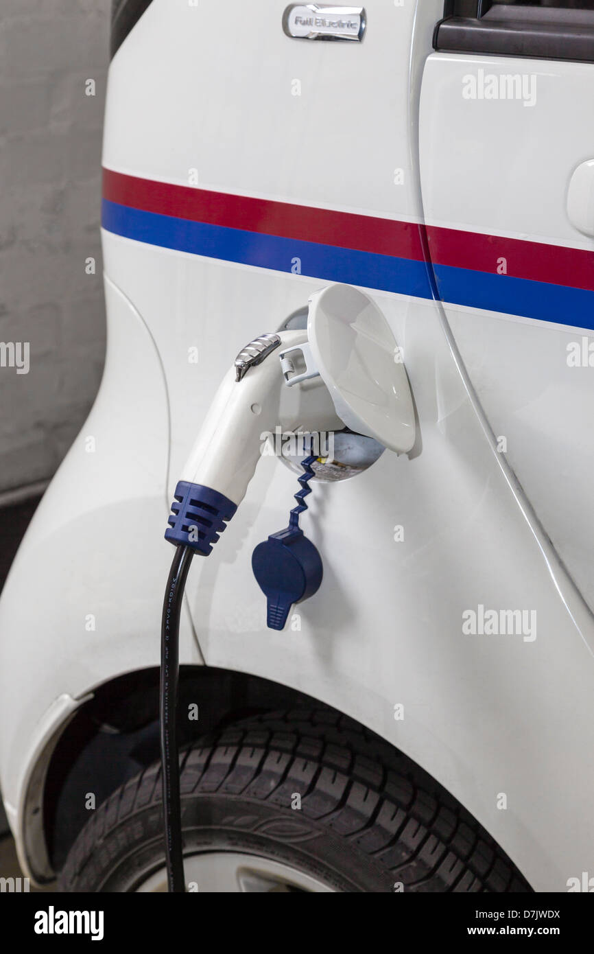 Cable plug and socket of an electric vehicle hi-res stock photography ...