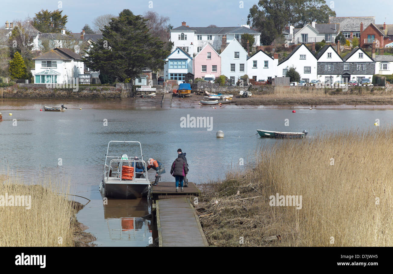 Passengers boarding the Topsham ferry on the banks of the river Exe ...