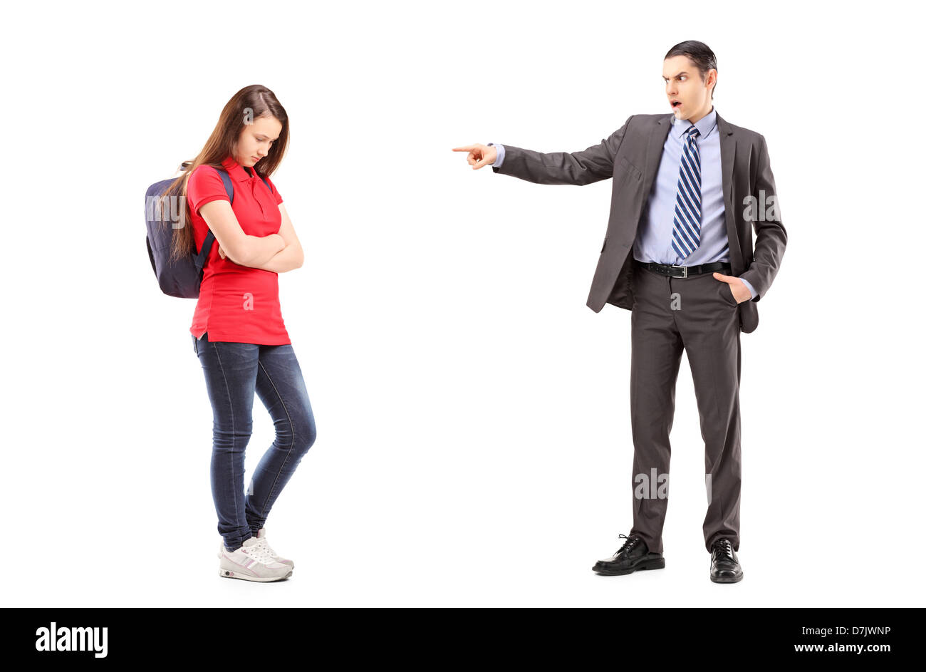 Full length portrait of an angry father shouting and pointing with his ...