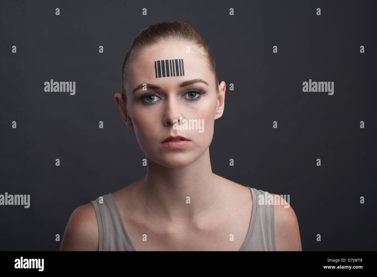 Studio portrait of woman with bar code on forehead Stock Photo - Alamy