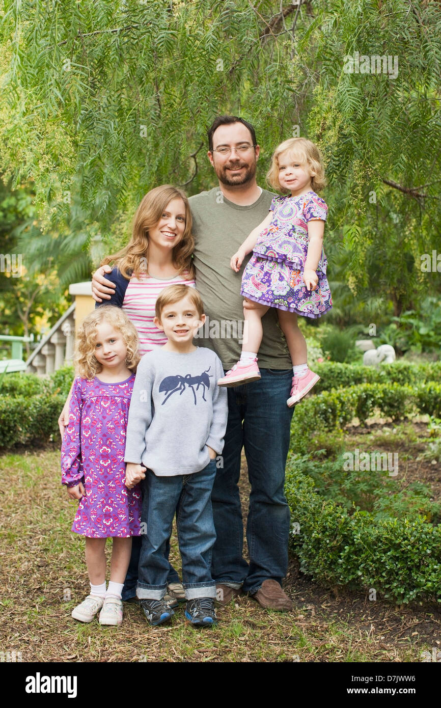 USA, California, San Juan Capistrano, Happy family with three children ...