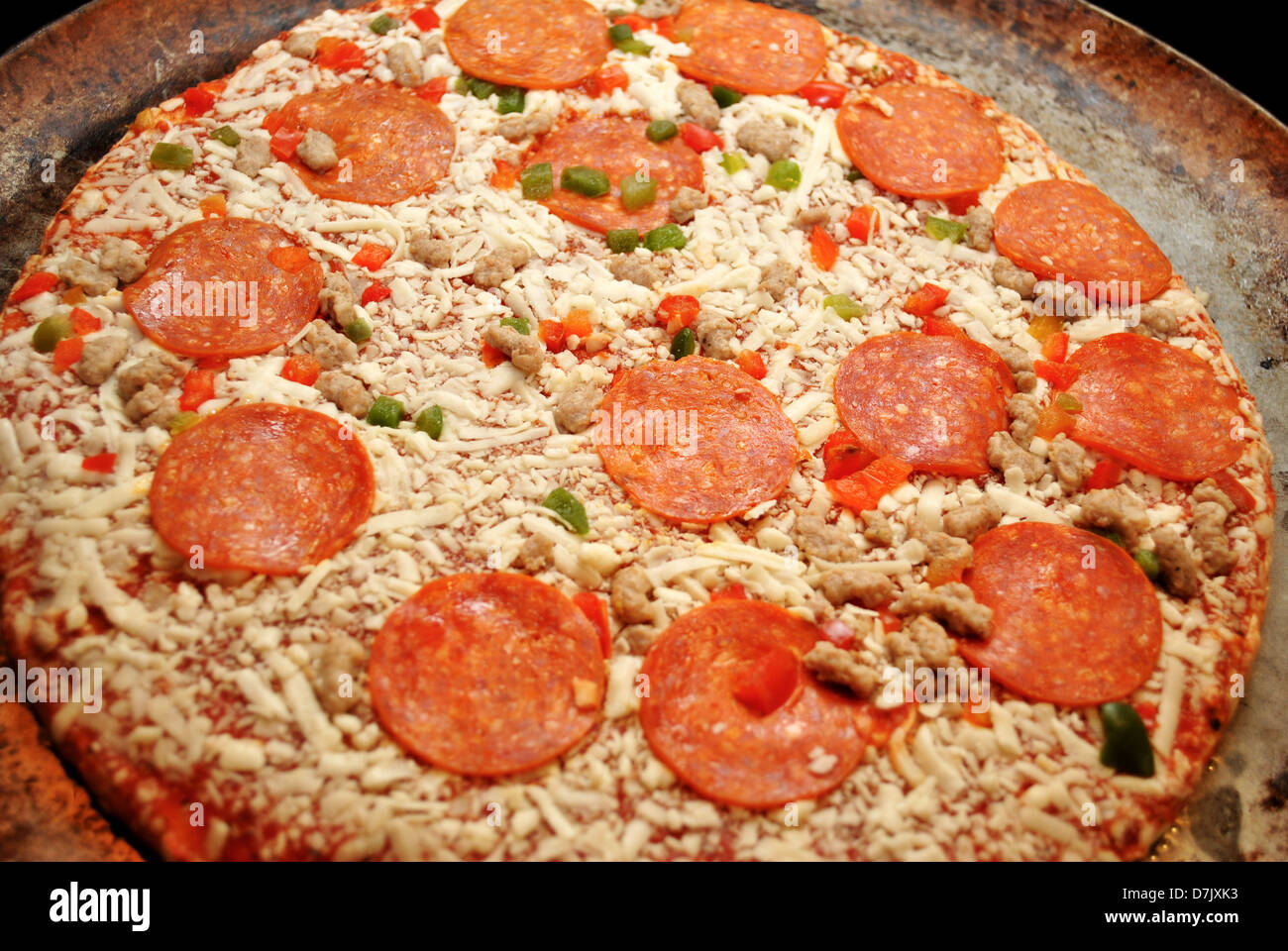 Cheese and Pepperoni Raw Pizza Pie Stock Photo - Alamy
