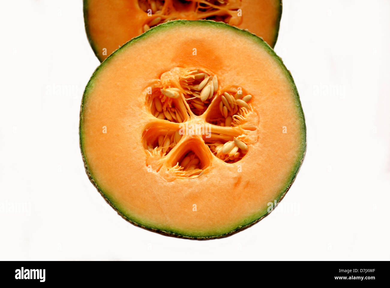 Cut in Half Melon Isolated Over White Stock Photo - Alamy