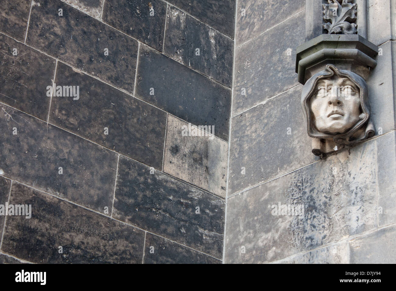 face sculpture on the church wall Stock Photo - Alamy