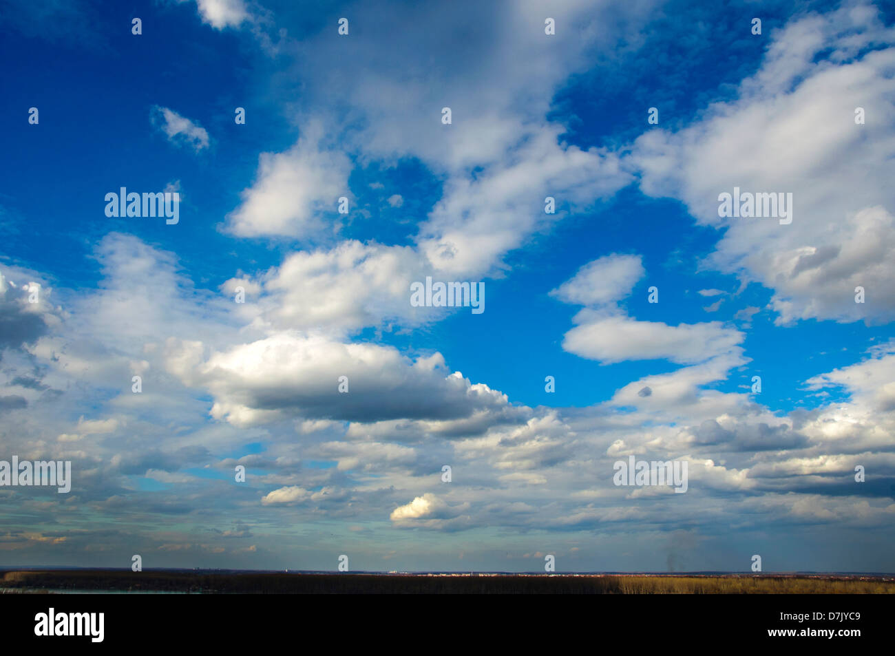 Beautiful landscape with white clouds and blue sky Stock Photo - Alamy