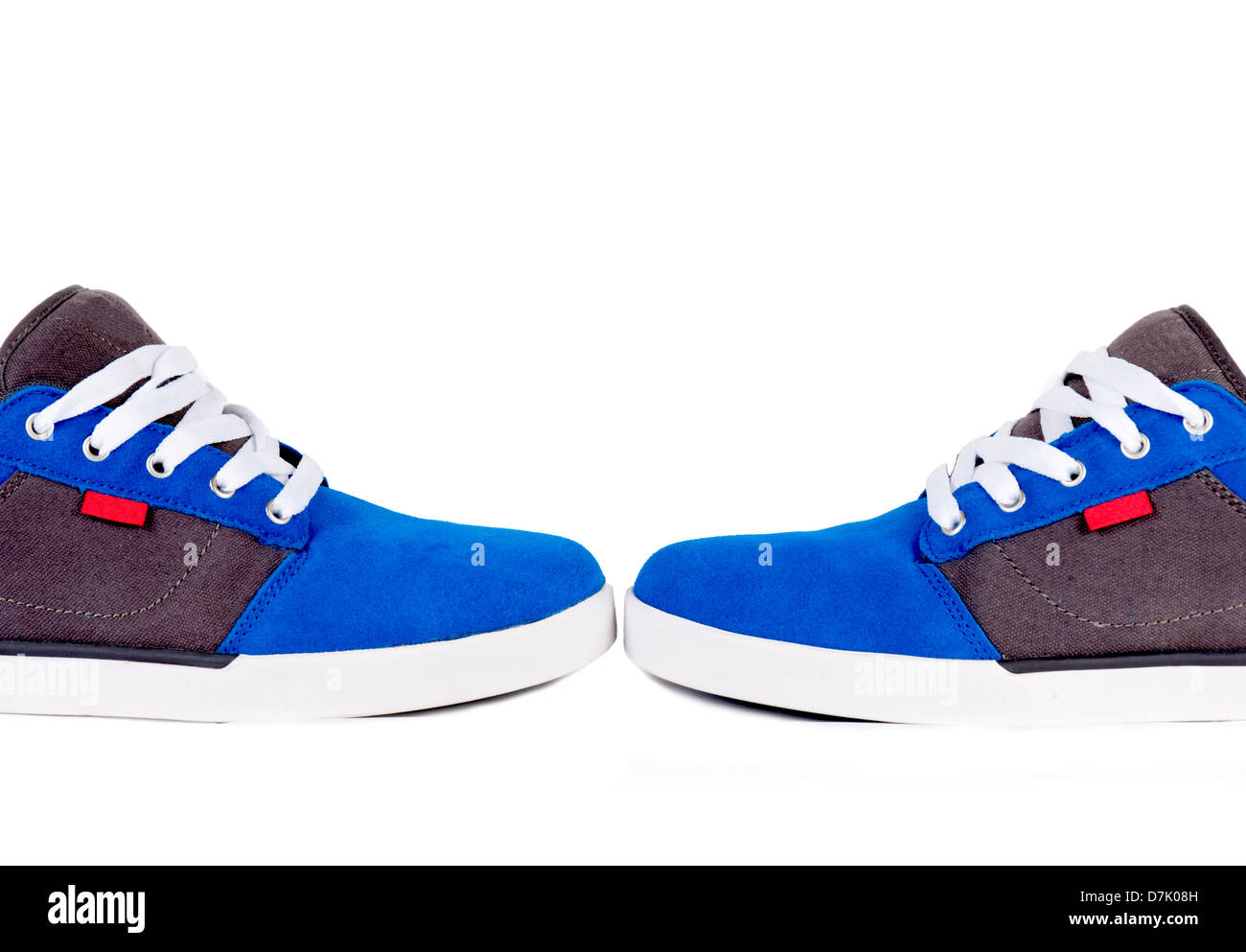 Blue snickers isolated on white background Stock Photo - Alamy