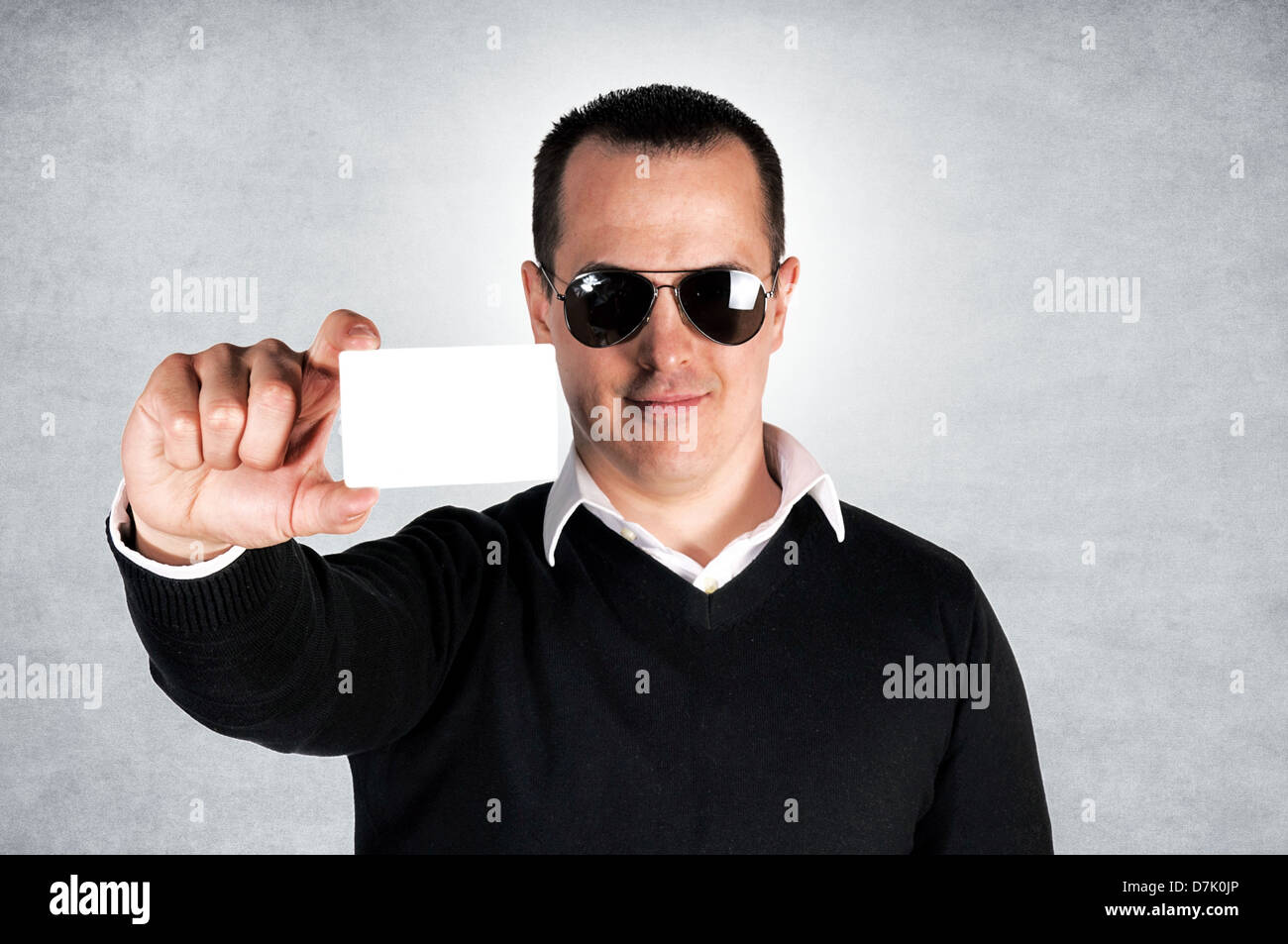 Man holding blank calling card Stock Photo - Alamy