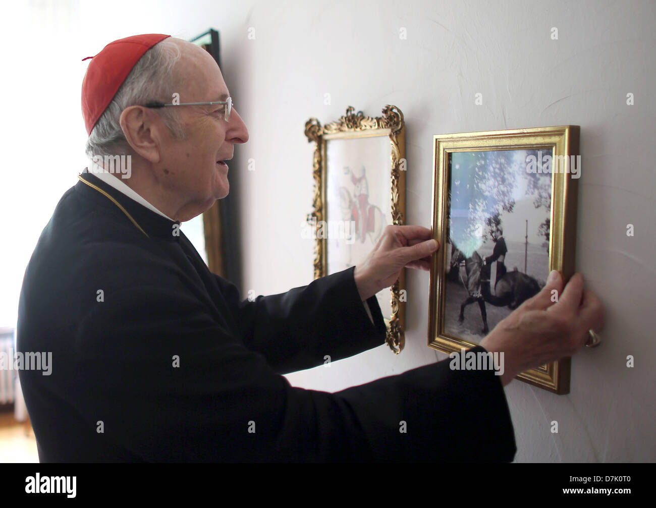 Cardinal Joachim Meisner, archbishop of Cologne, looks at a photo from ...