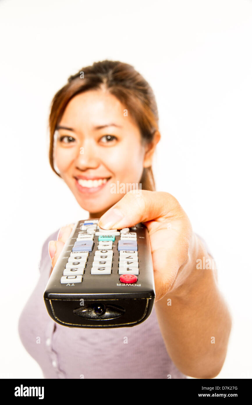 asian woman with romote control Stock Photo - Alamy