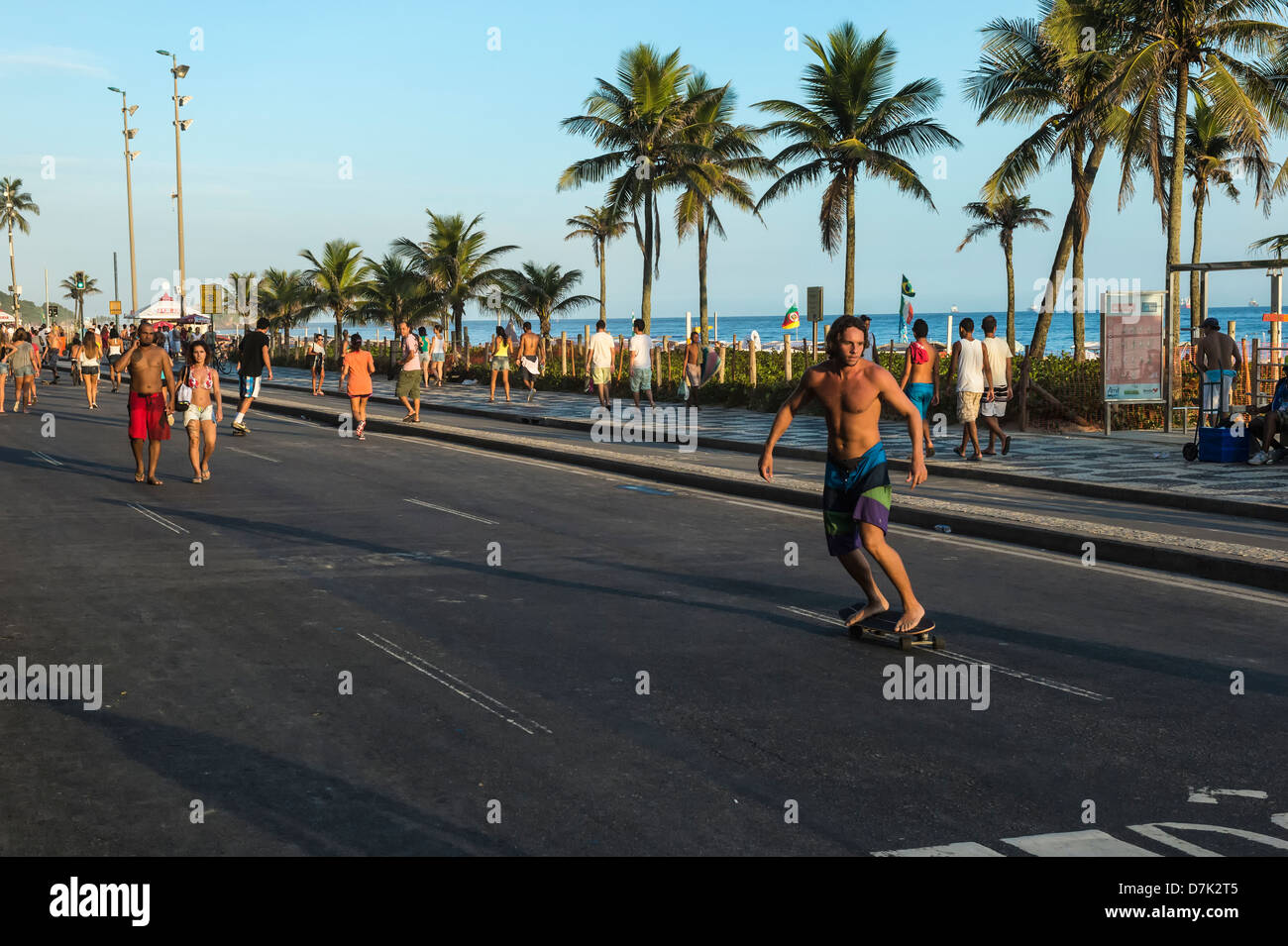 People walking along the sidewalk at Ipanema Beach, Rio de Janeiro ...